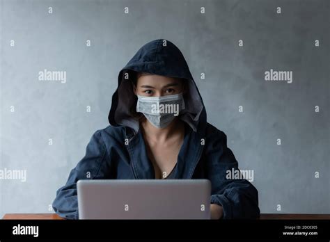 Hacker Asia Woman Stealing Data From Online Computer Systems By Using Laptop Concept Of