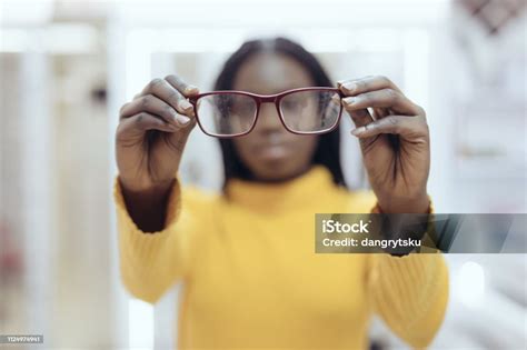 Young African Woman Pointed Eyeglasses Frames In Optical Store Cute