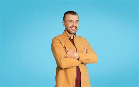 Guy Smiling With Arms Crossed Images Free Download On Freepik