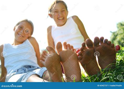 Bare Girls Feets On A Stone Path In A Park Stock Image Cartoondealer