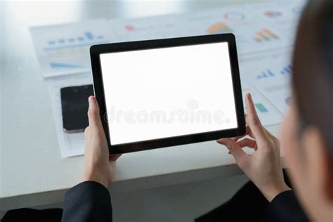 A White Screen Tablet Computer Placed On The Desk At Work Can Put Text Or Media In The Area On