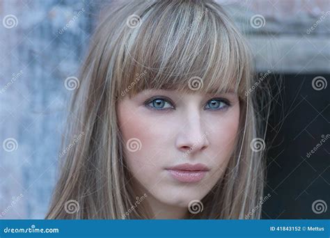 Headshot Of A Blond Haired Women With Blank Expression Of A Face Stock