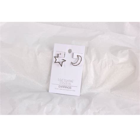 Winter Neutrals Silver Chiarra Moon And Star Mismatched Earrings