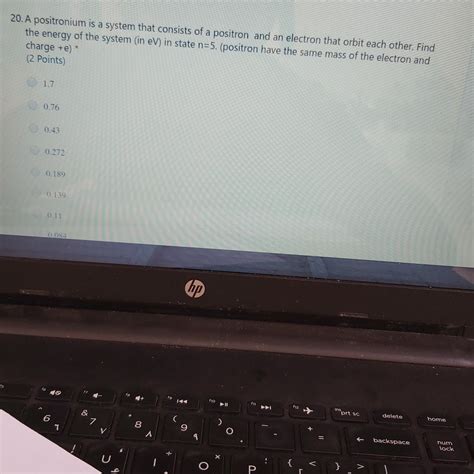 Solved 20 A Positronium Is A System That Consists Of A