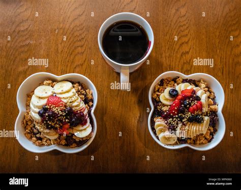 Healthy Acai Berry Bowls With Fruit And Granola And Black Coffee Stock