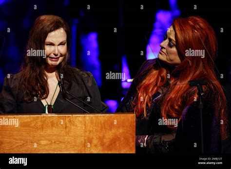 Ashley Judd Left Cries As She Speaks As Sister Wynonna Judd Watches