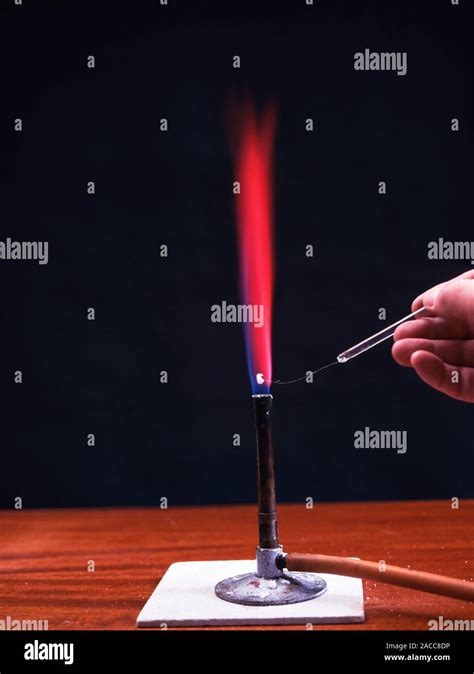 Flame Test Lithium Burning In The Flame Of A Bunsen Burner Producing A Pink Red Flame The