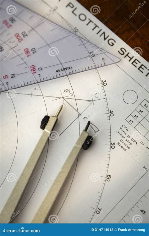 Above Image Of A Navigator S Radar Plotting Chart With A Triangle And Compass Divider Stock
