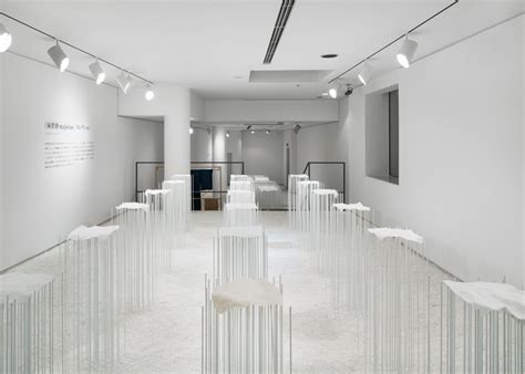 Hemp Textiles Are Laid Across Metal Rods In Japanese Exhibition