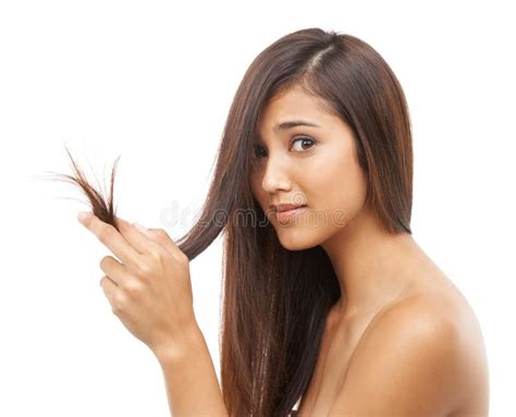 Split Ends Driving You Crazy Portrait Of An Attractive Young Woman With Long And Healthy Hair
