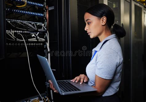 Engineer Laptop Database And Woman In Server Room For Software Update Or Maintenance At Night