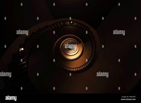 Spiral Staircase In A Tall Multi Floor House In The Form Of A Golden Ratio Architecture