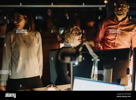 Collaborative Business Team Analyzing Reports For Project Development