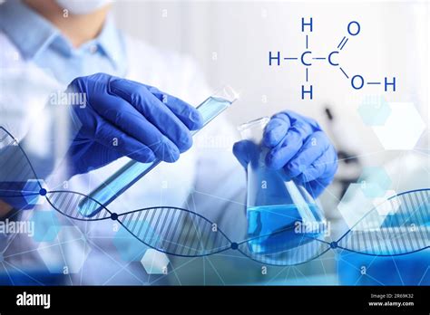 Laboratory Worker Pouring Blue Liquid Into Flask Indoors Structural