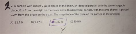 Solved A Particle With Charge 2 Mu C Is Placed At The Chegg Com