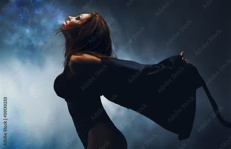 Sexy Woman Posing Over Dark Background Stock Photo Adobe Stock