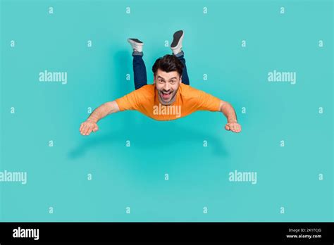 Full Length Photo Of Guy Flying In Air Falling Down Virtual Game