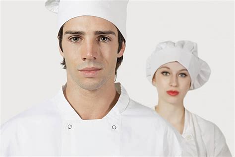 Gray Background Portrait Featuring Two Young Chefs In Uniform Photo And