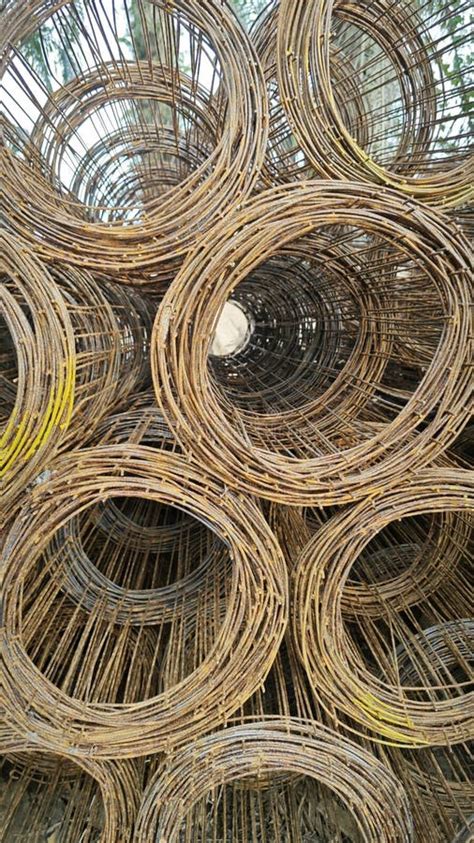 Roll Up Rusty Steel Rebar Grid Reinforcement Frame Lying On The Ground For Building Construction