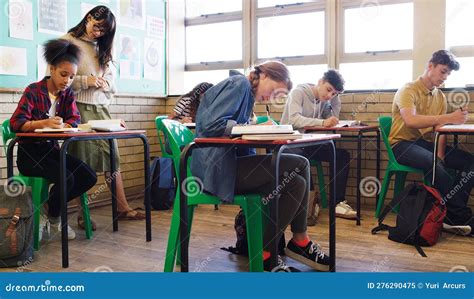 Youre Doing Really Well Keep Going A Cheerful Young Teacher Giving