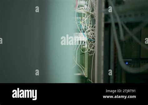 A Bunch Of Patch Network Cables Sorted In A Rack Cabinet Leading From A Patch Panel In A Server