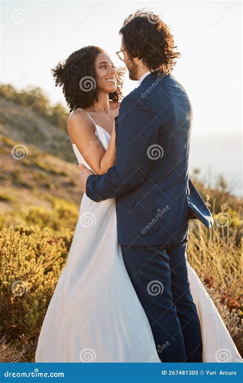 Wedding Couple Interracial And Hug In Nature Happy And Excited While Celebrating Love