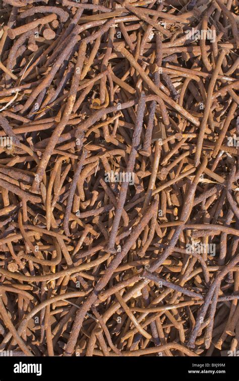 A Number Of Rusty Nails Backgrounds Stock Photo Alamy