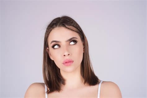 Premium Photo Woman With Confuse Face Expression Having Doubts Thoughtful Girl Portrait Of