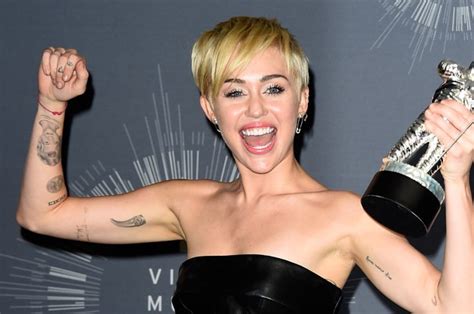 Miley Cyrus Tattoos That Express True Fandom
