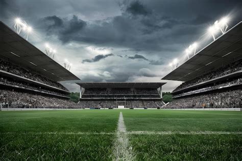 Expansive Stadium Filled With Spectators Under Bright Floodlights