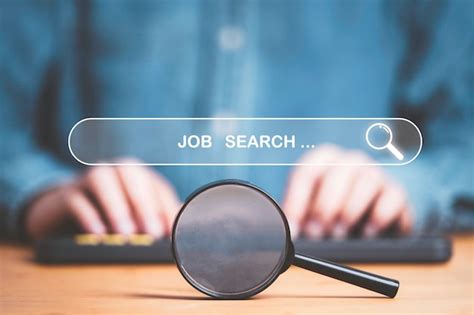 Premium Photo Businessman Typing To Computer Keyboard With Magnifier