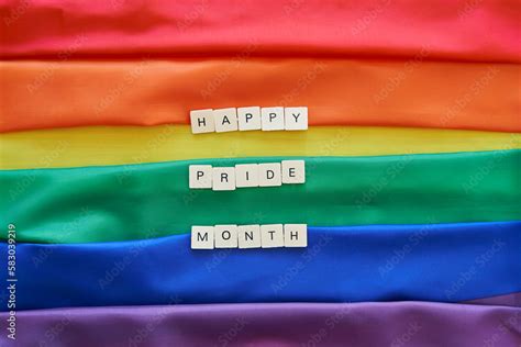 Happy Pride Month Concept Happy Pride Month Spelled With Craft Letters Over Lgbt Rainbow Flag