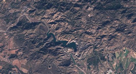 Enhancing Water Body Detection With Shadow Awareness In Remote Sensing Evoland