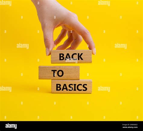Back To Basics Symbol Concept Word Back To Basics On Wooden Blocks Businessman Hand Beautiful