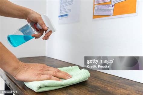Wiping Down Tables Photos And Premium High Res Pictures Getty Images