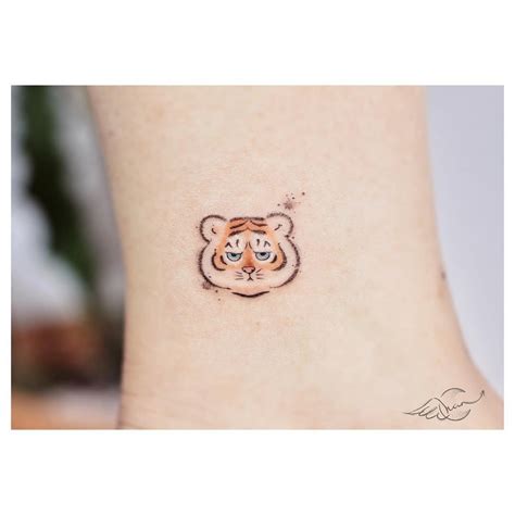 Minimalist Tiger Face Tattoo Sleek Design For Modern Identity