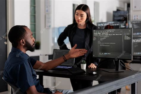 Premium Photo Diverse Team Of Software Developer Developing Html Code And Cloud Computing In