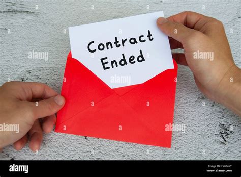 Contract Ended Text On White Notepad With Red Envelope Background