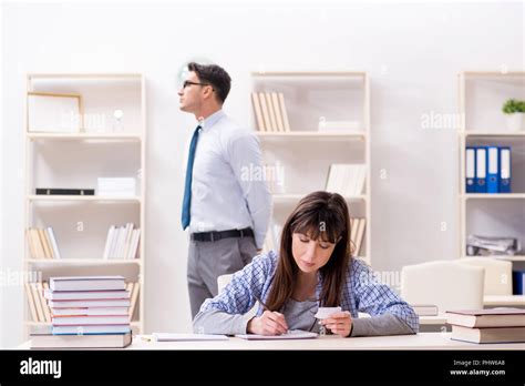 Male Lecturer Giving Lecture To Female Babe Stock Photo Alamy