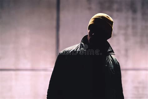 A Mysterious Person Standing In The Middle Of The Road Stock Image