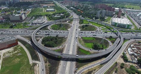Premium Photo Cloverleaf Intersection With Circular Overpass Aerial View