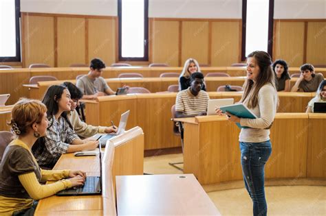 Premium Photo University Professor Explaining To Her Students In The