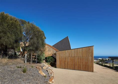 Split House By Bkk Architects Is Made Up Of Angular Wooden Structures