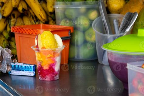 Preparation Of A Traditional Sweet Water Ice With Fruits Called Cholado