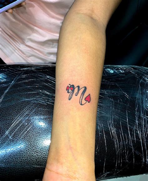 20 Elegant M Letter Tattoo Designs For Timeless Appeal