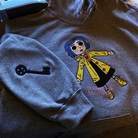 Coraline Button Eyes Embroidered Sweatshirt Western Meowdy
