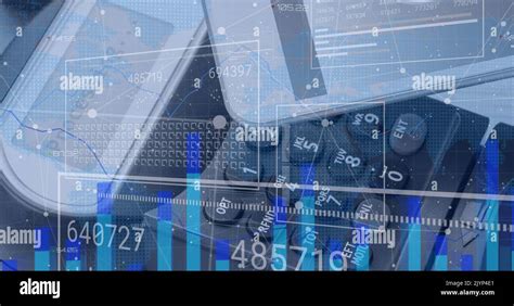 Image Of Financial Data Graphs Processing On Digital Interface Against Credit Card Reader Stock