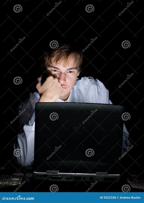 Computer Hacker Silhouette Of Hooded Man With Binary Data Screen And Network Security Terms