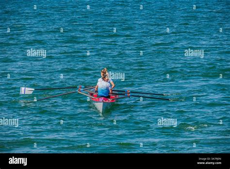 Single Scull Rowing On Fethiye Waters One Individual Rows A Single Scull Boat On The Moderately