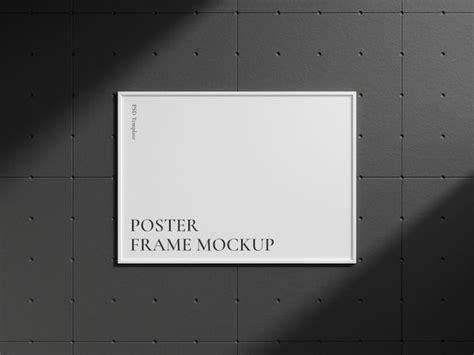 깨끗하고 미니멀한 전면 뷰 흰색 사진 또는 포스터 프레임 모형이 그림자 3d 렌더링을 사용하여 산업 벽돌 벽에 매달려 있습니다 프리미엄 Psd 파일